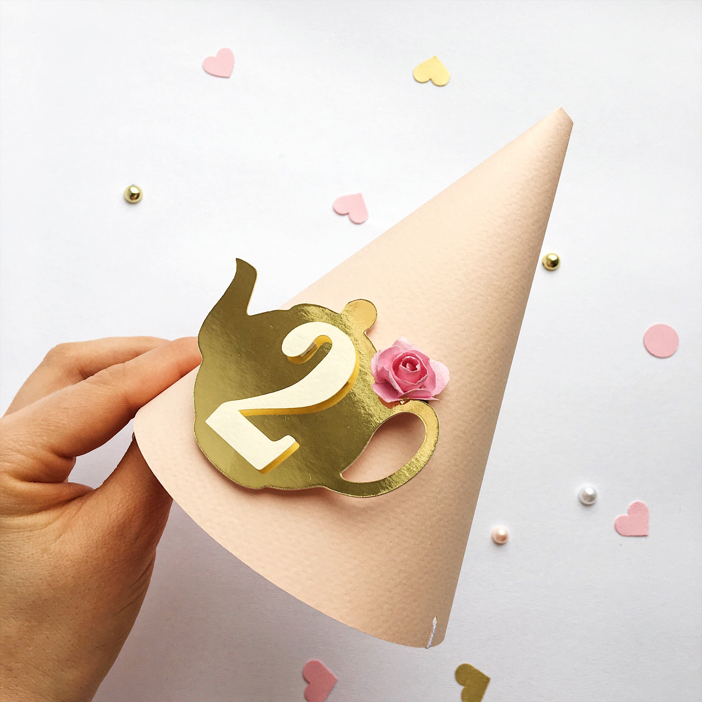 Tea Party-style design for a baby's first birthday